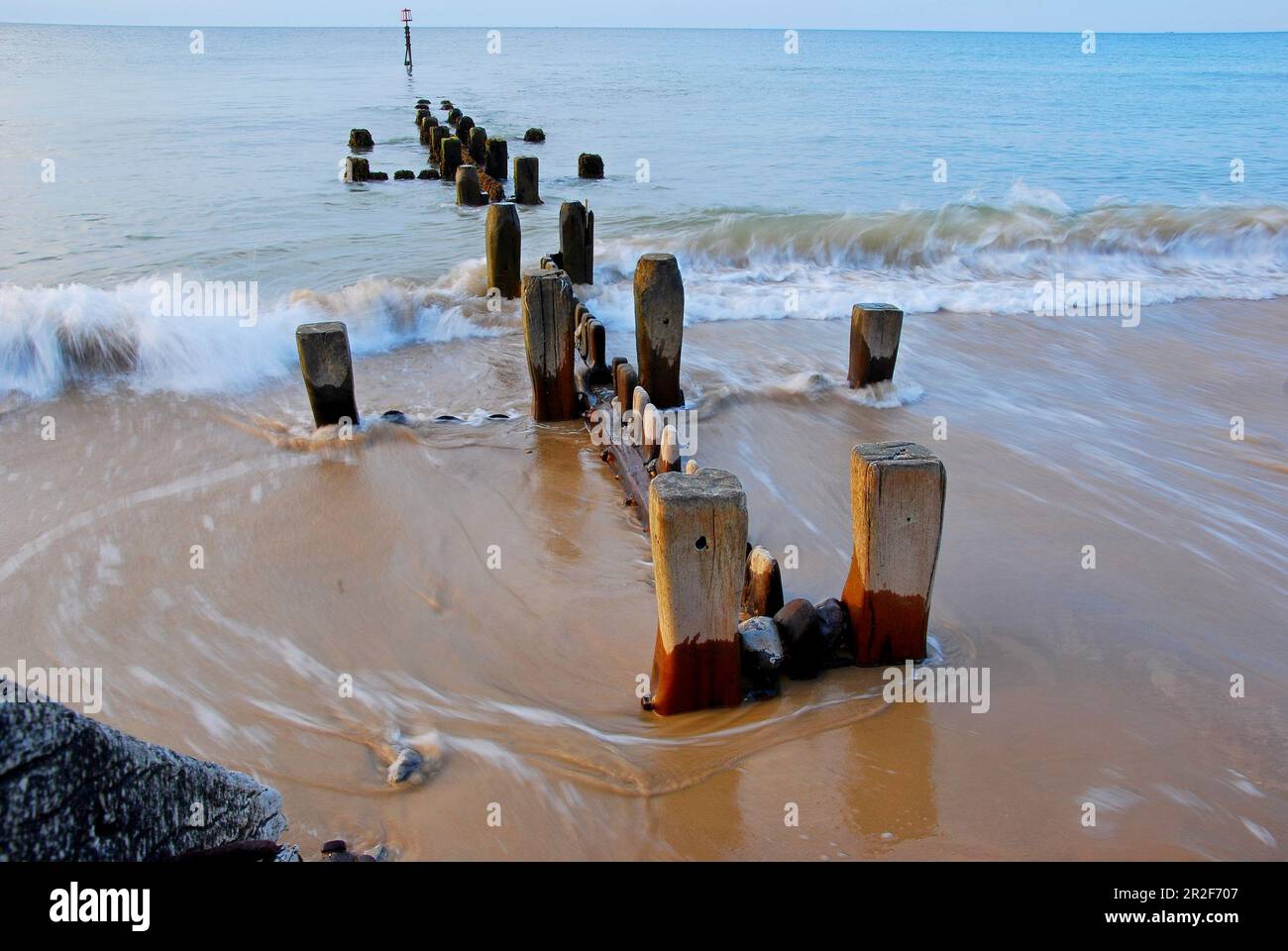 Sea defence groynes waves hi-res stock photography and images - Alamy
