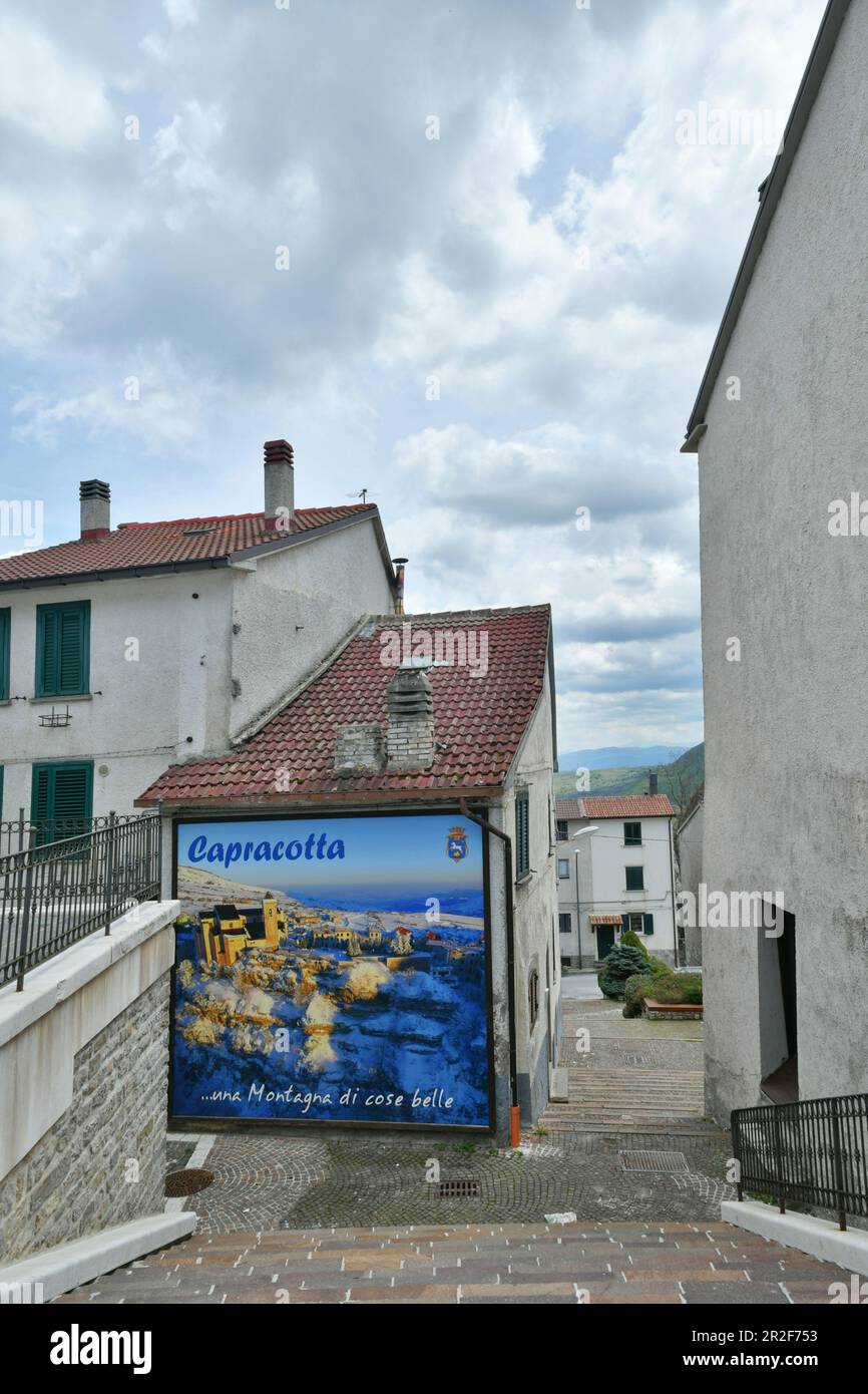 A narrow street of Capracotta, a medieval village in the mountains of ...