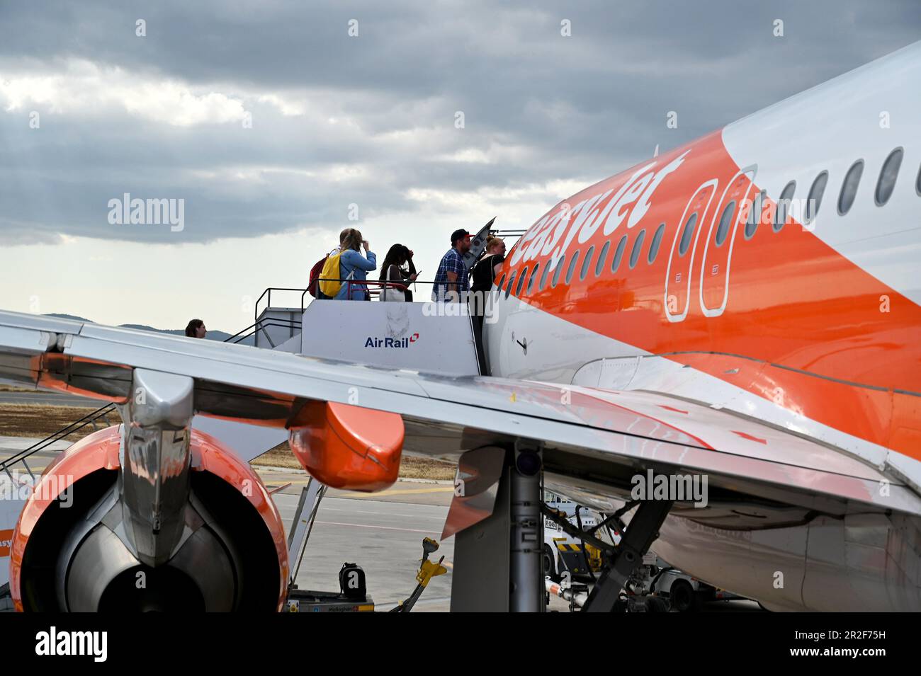 Passengers board an EasyJet flight at Parma Majorca. May 2023 Stock ...