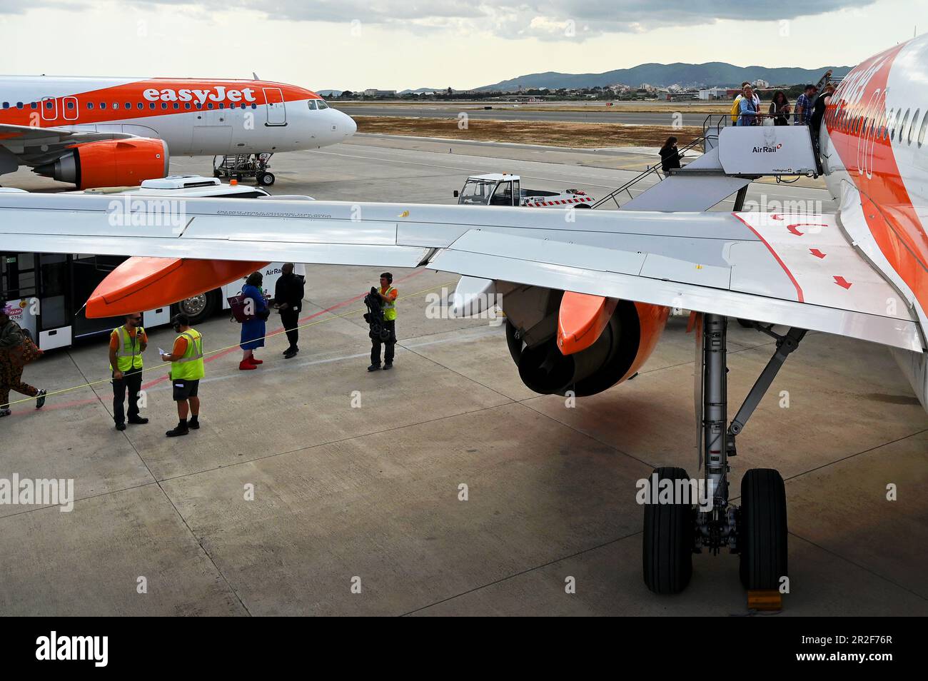 Passengers board an EasyJet flight at Parma Majorca. May 2023 Stock ...