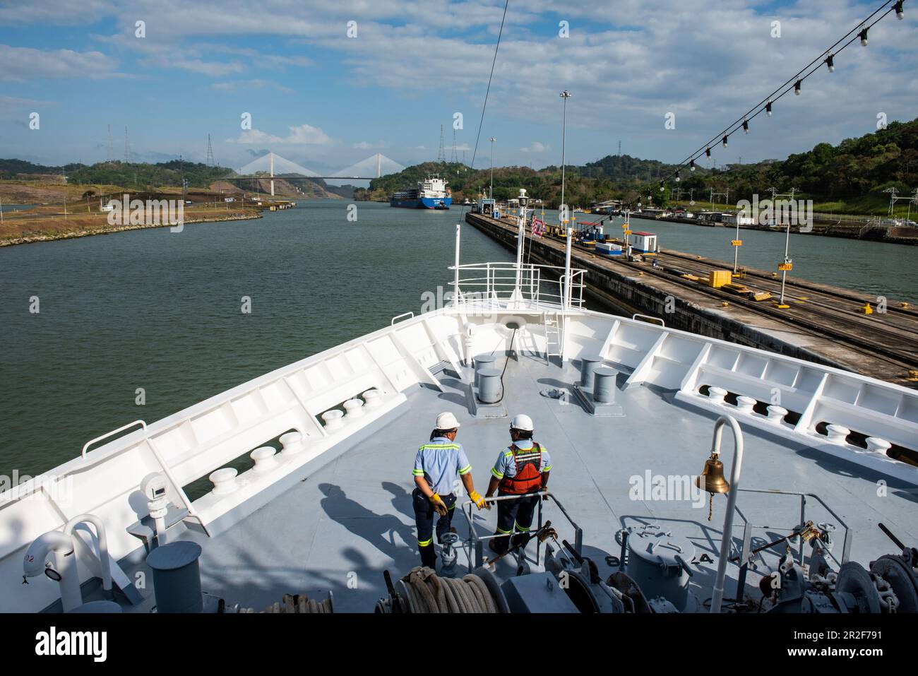 View of the bow of an expedition cruise ship with two workers from the ...