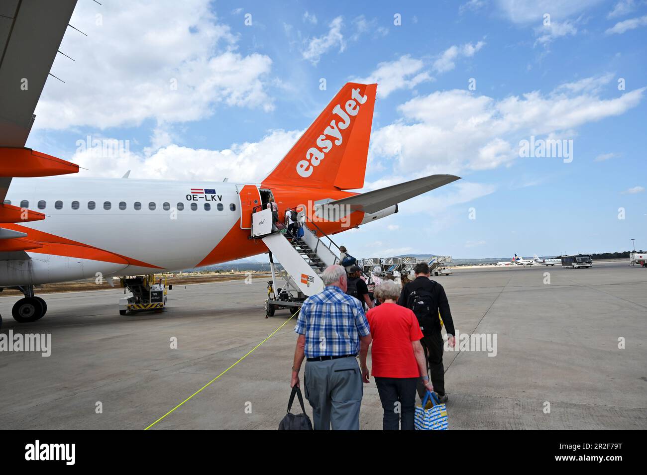 Passengers board an EasyJet flight at Parma Majorca. May 2023 Stock ...