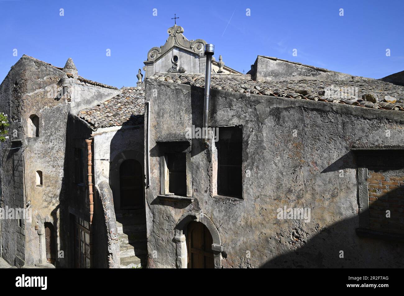 Landscape with scenic view of old medieval architecture in Forza d'Agrò ...