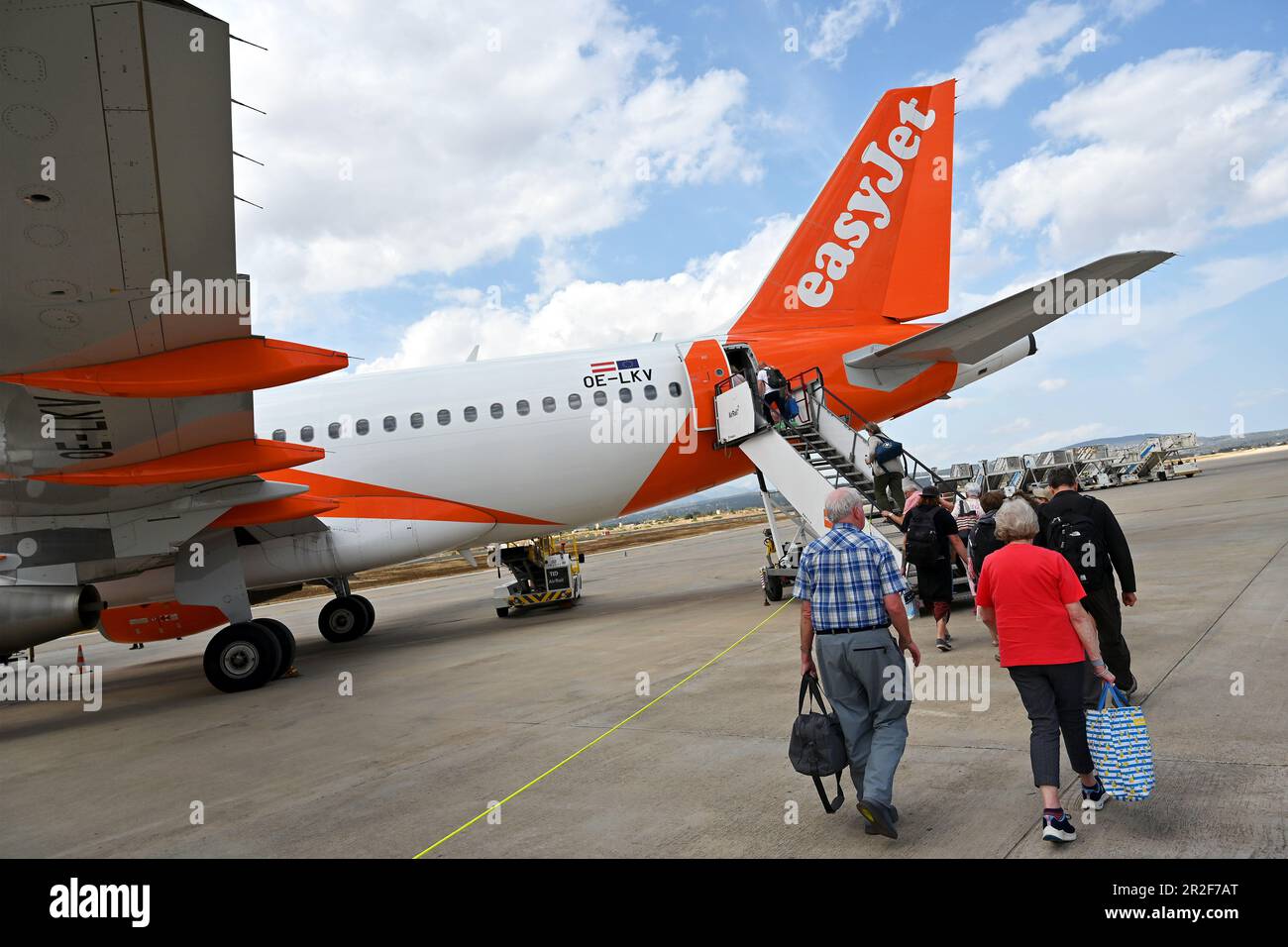 Passengers board an EasyJet flight at Parma Majorca. May 2023 Stock ...