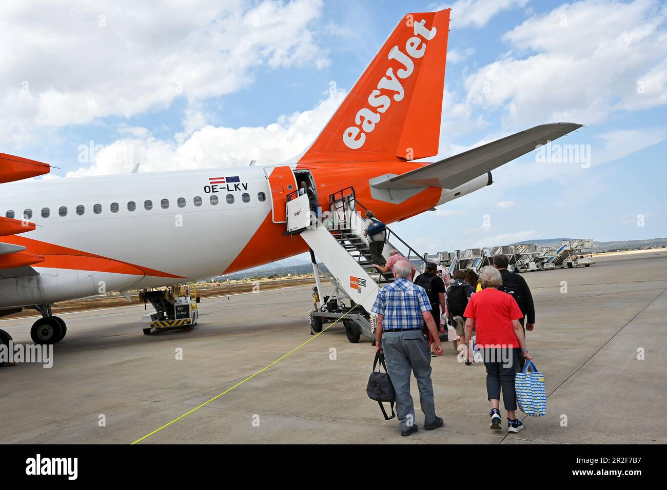 Passengers board an EasyJet flight at Parma Majorca. May 2023 Stock ...
