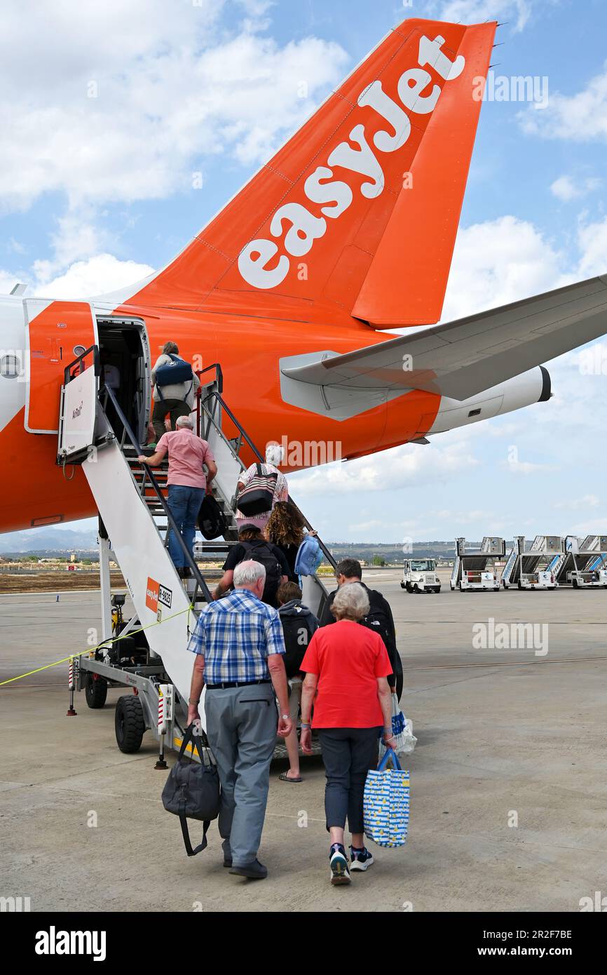 Passengers board an EasyJet flight at Parma Majorca. May 2023 Stock ...