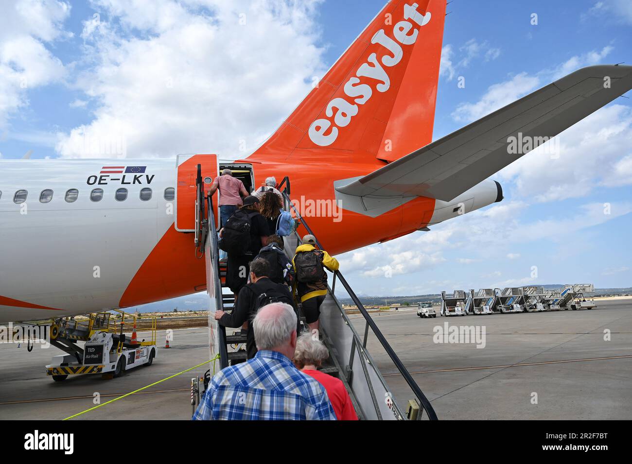 Passengers board an EasyJet flight at Parma Majorca. May 2023 Stock ...