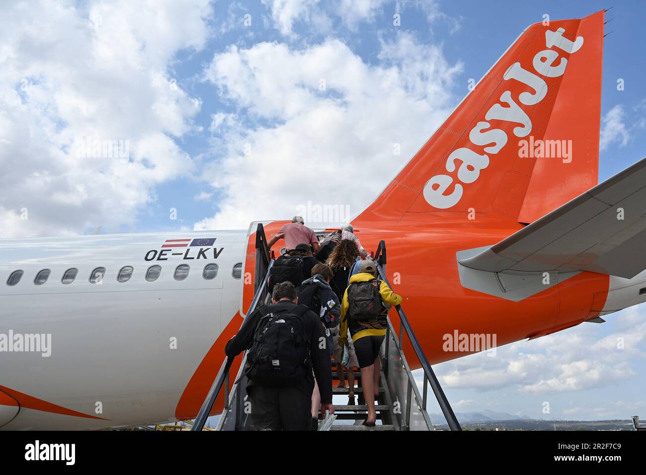 Passengers board an EasyJet flight at Parma Majorca. May 2023 Stock ...