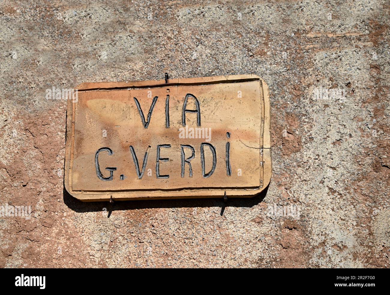 Antique custom carved terracotta street sign in Forza d'Agrò Sicily ...