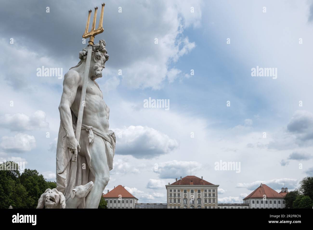 View of Nymphenburg Palace, in the foreground a statue from the Garden ...