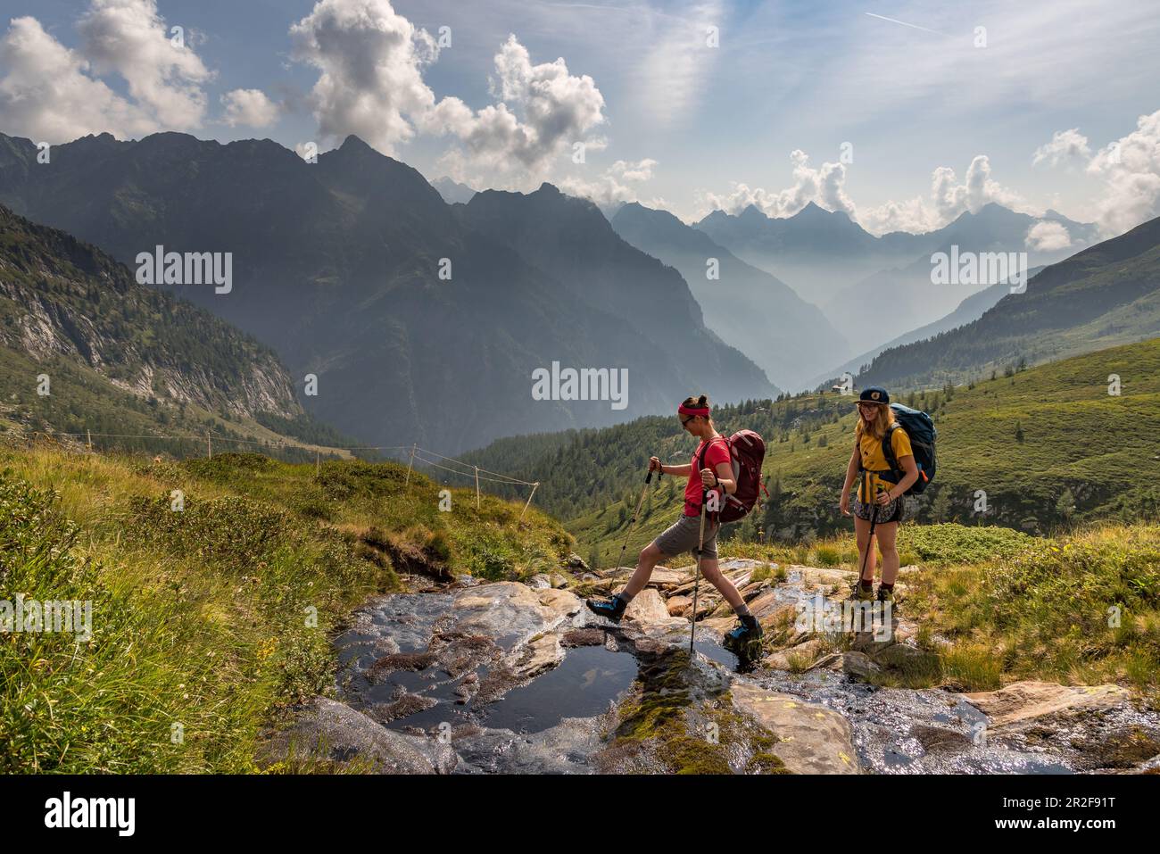 Crossing the stream, Trekking del Laghetti Alpini, Ticino, Switzerland ...