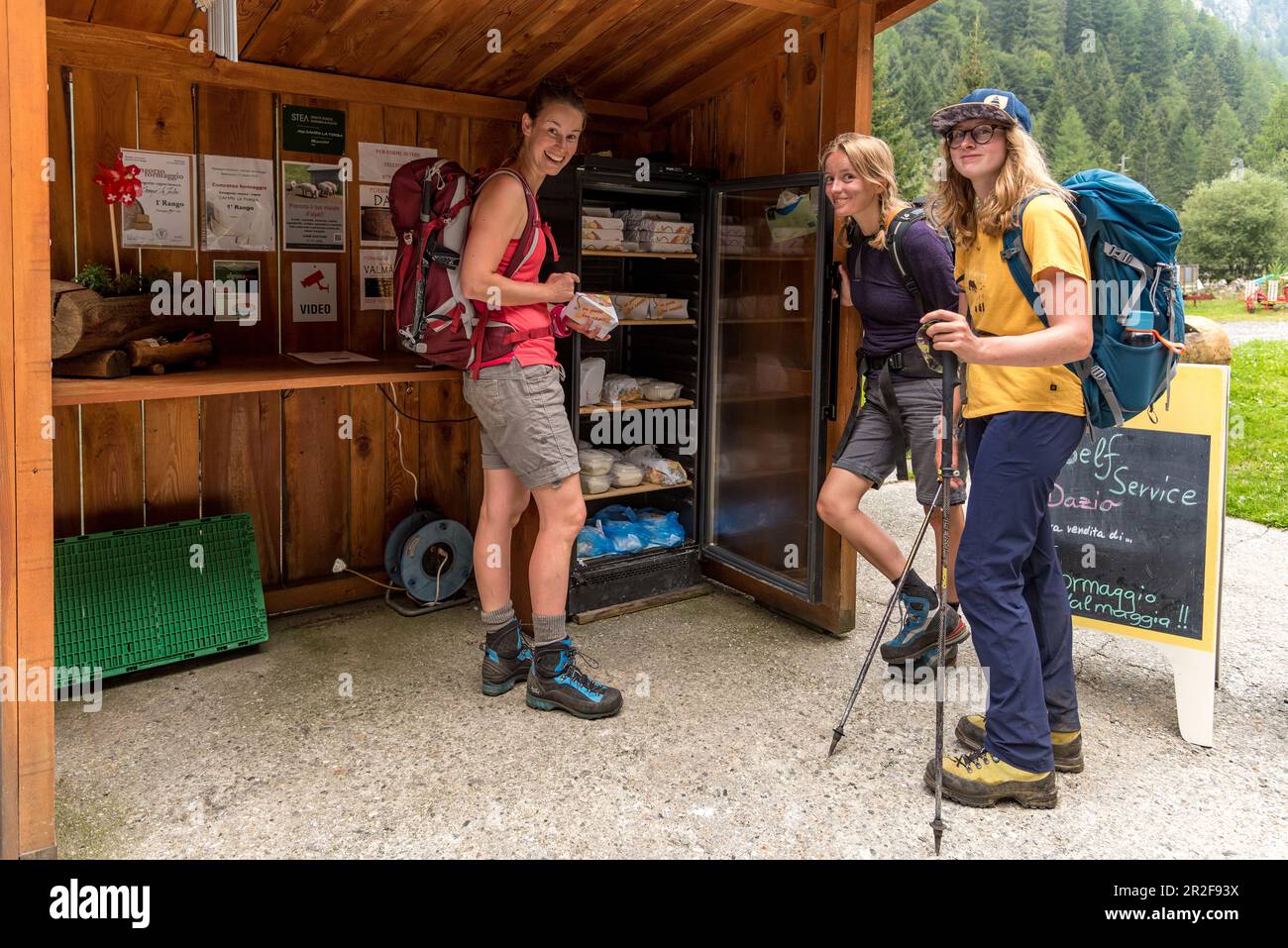 Self-service counter with alpine cheese in Fusio, Trekking del Laghetti ...