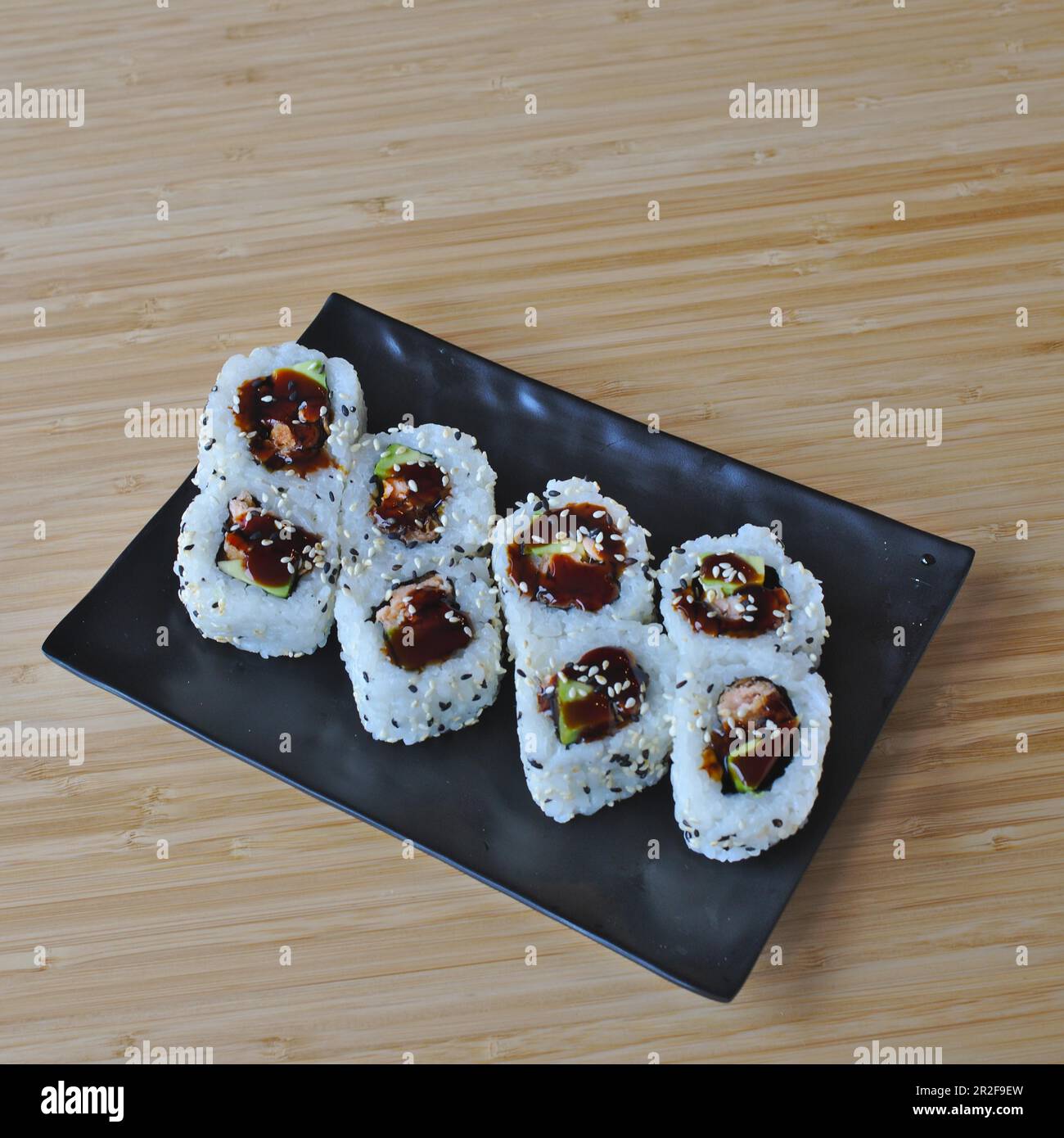Asian Japanese Food sushi Salmon Teriyaki Roll Stock Photo - Alamy