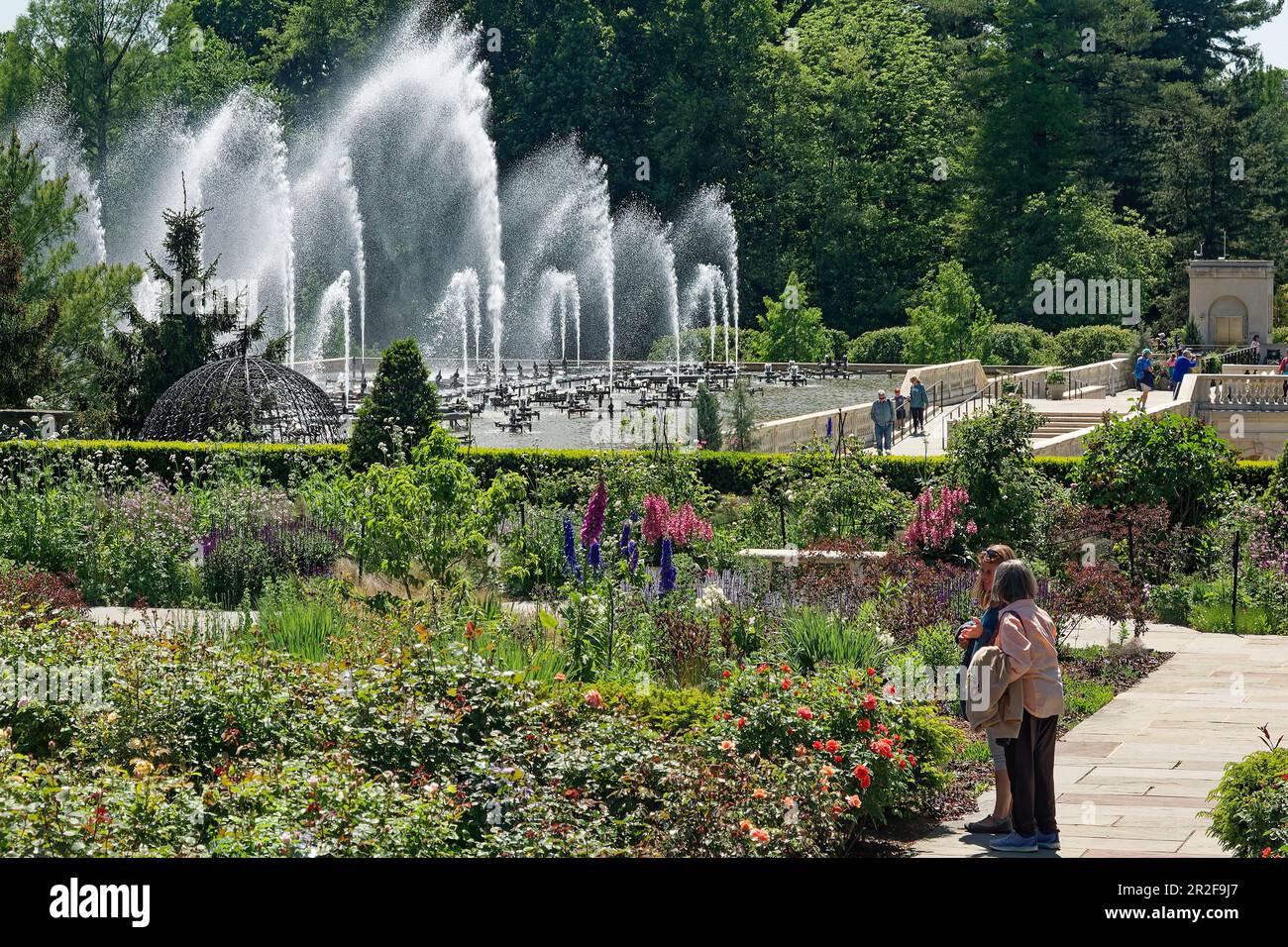 People part of main fountain garden beyond hi-res stock photography and ...