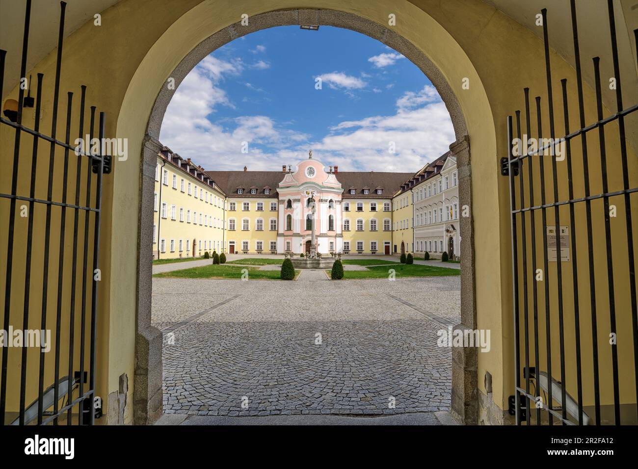 View through entrance gate to Metten Benedictine Abbey, Metten, Danube ...