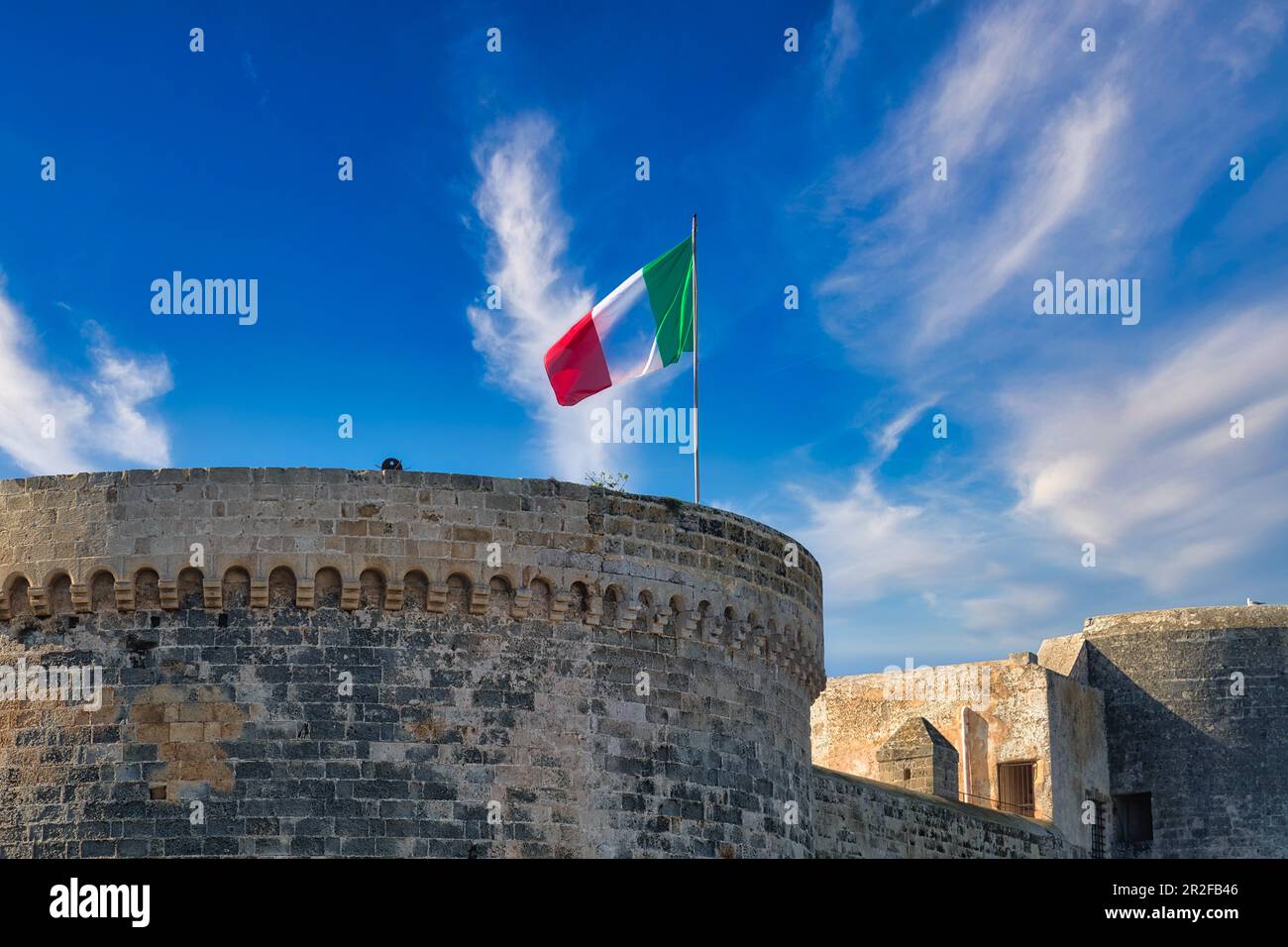 Italian flag on the Castelo in the fishing port of Gallipoli, Apulia ...