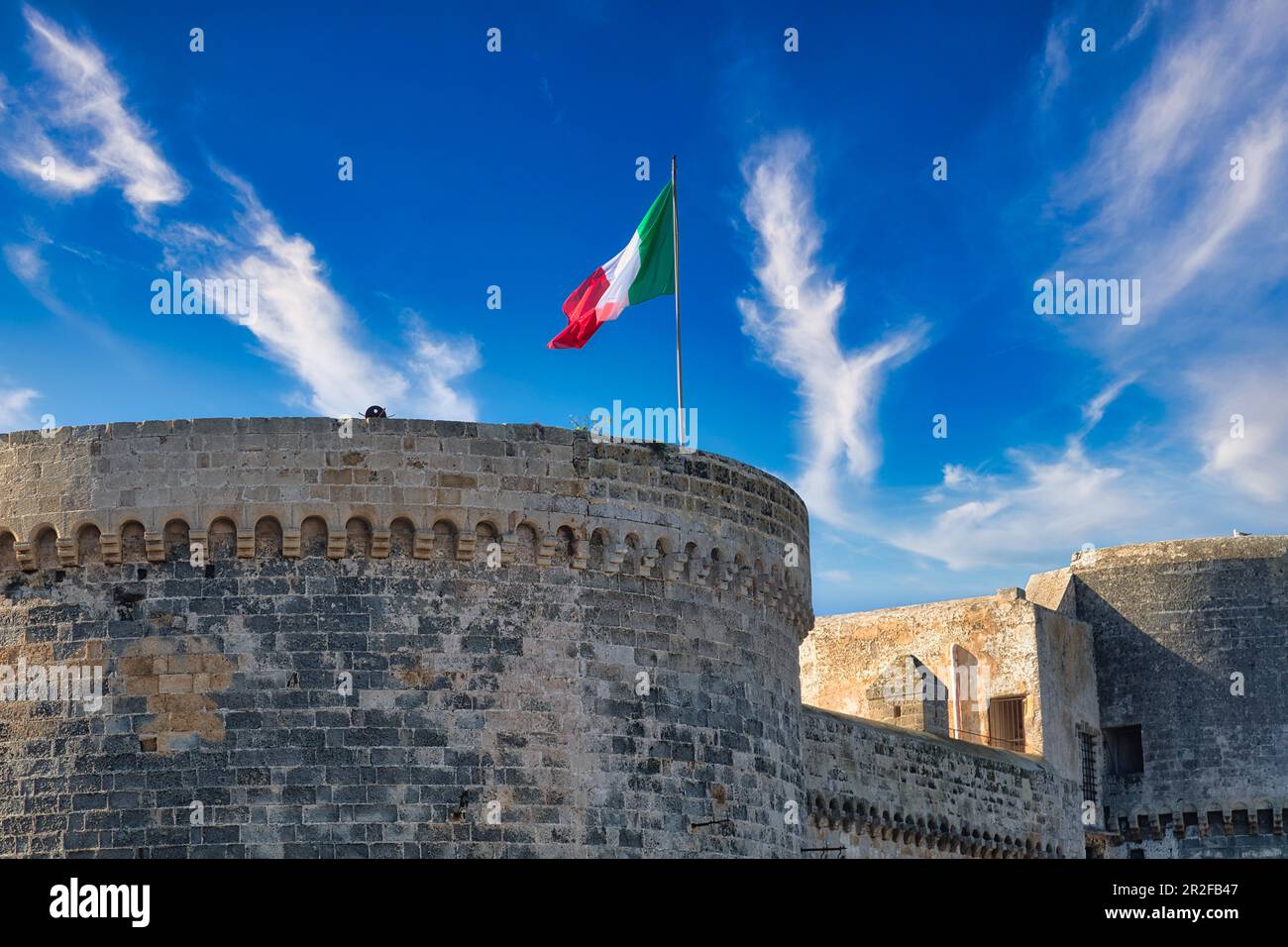 Italian flag on the Castelo in the fishing port of Gallipoli, Apulia ...