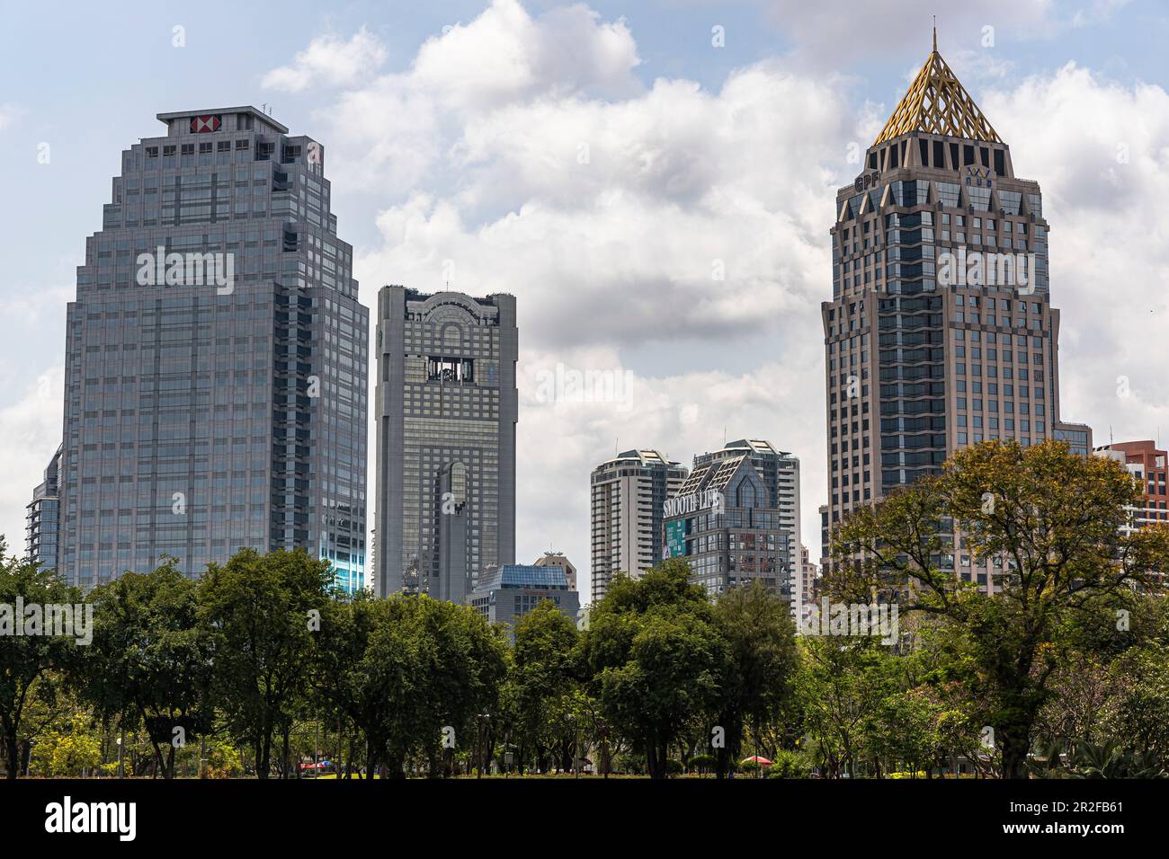 View from Lumphini Park to high-rise buildings in Silom, Bangkok ...