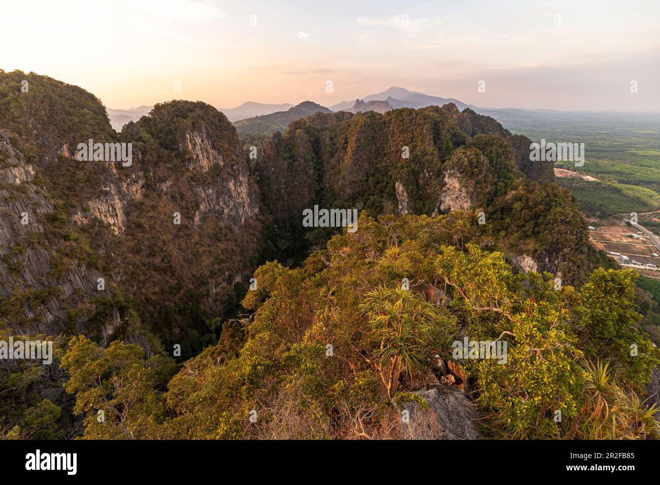 Sunset over karst rock landscape, Tiger Cave Mountain, Tiger Cave ...