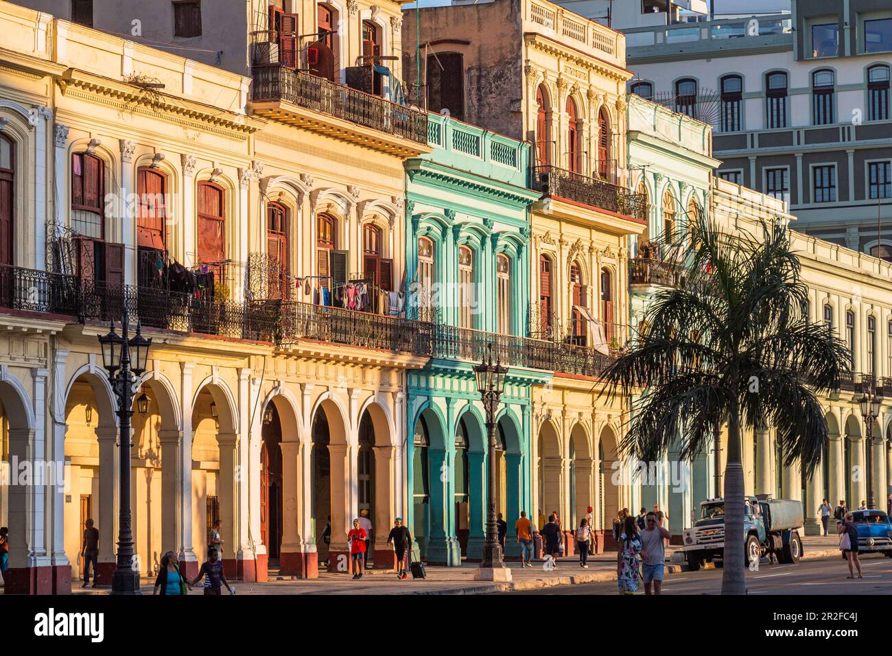 Colorful colonial style house facades in evening light, Old Havana ...