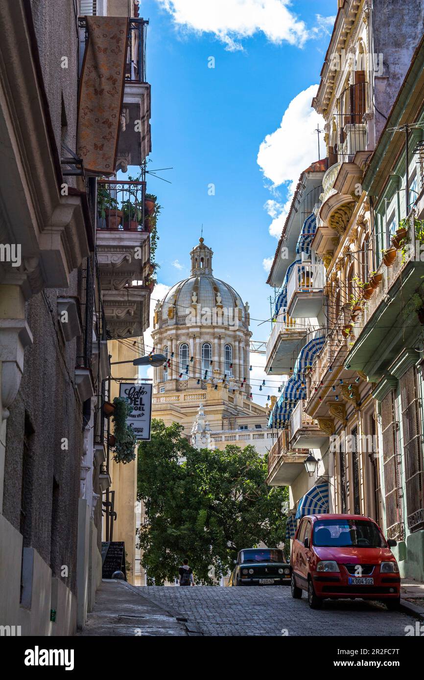 Cuban alley with colonial houses and view of Capitol, Old Havana, Cuba ...