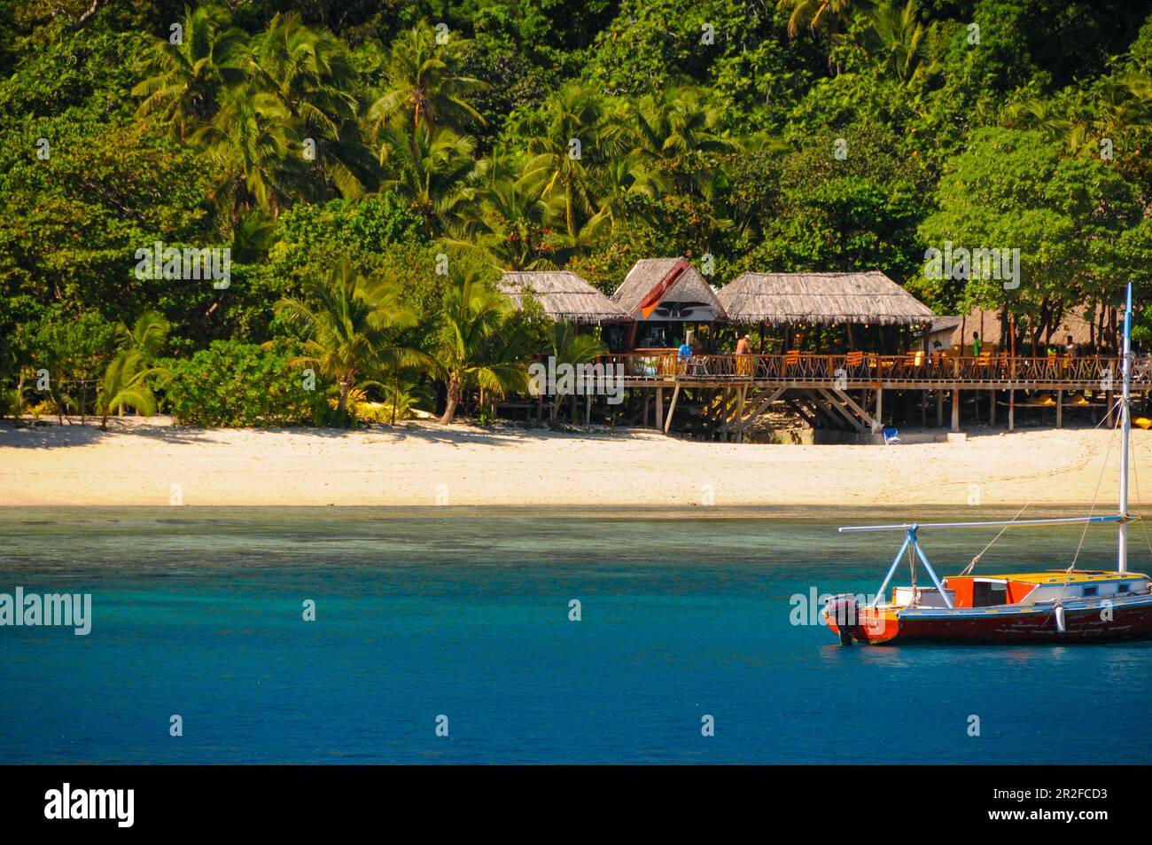 Beach bar amidst tropical vegetation, Botaira Resort, Naviti Island ...