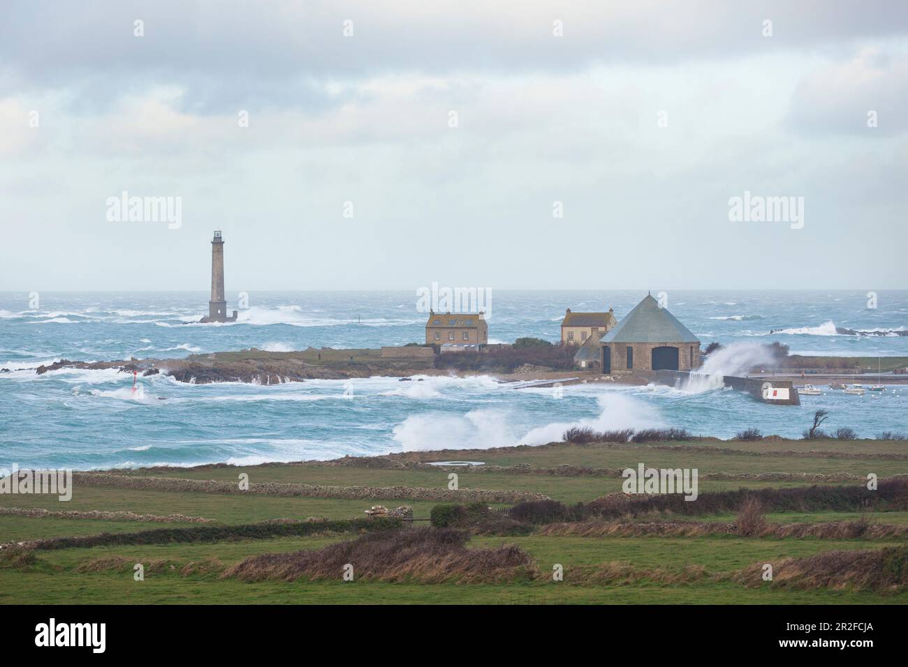Goury harbor in the storm, northern tip of the Cotentin, Normandy ...