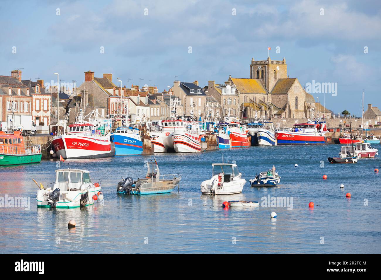 Harbor with church in Barfleur Normandy. St Nicolas Church - Monument ...