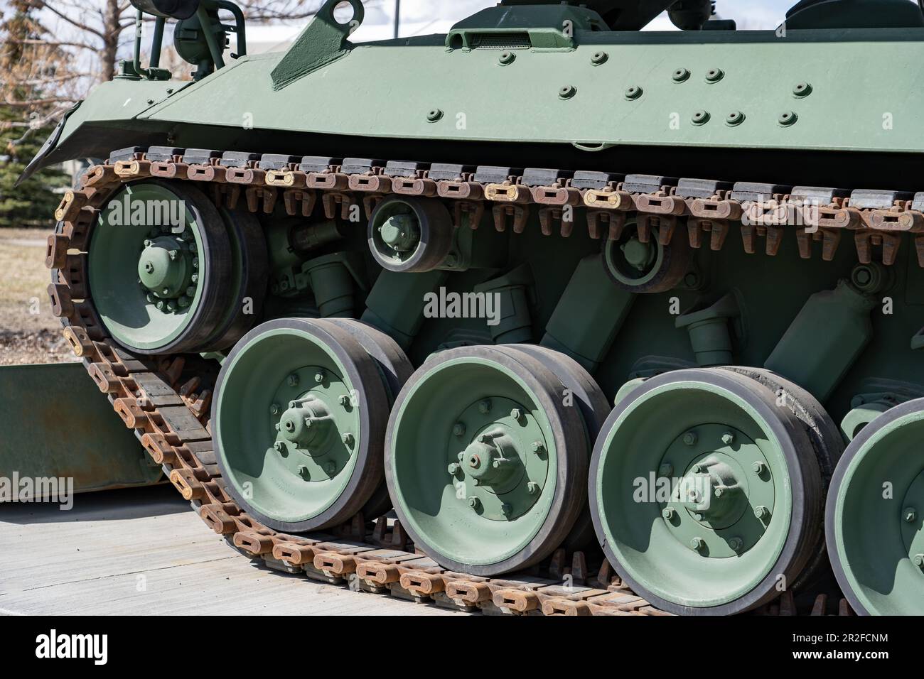 Tank tracks parked on concrete with green camouflage colour Stock Photo ...