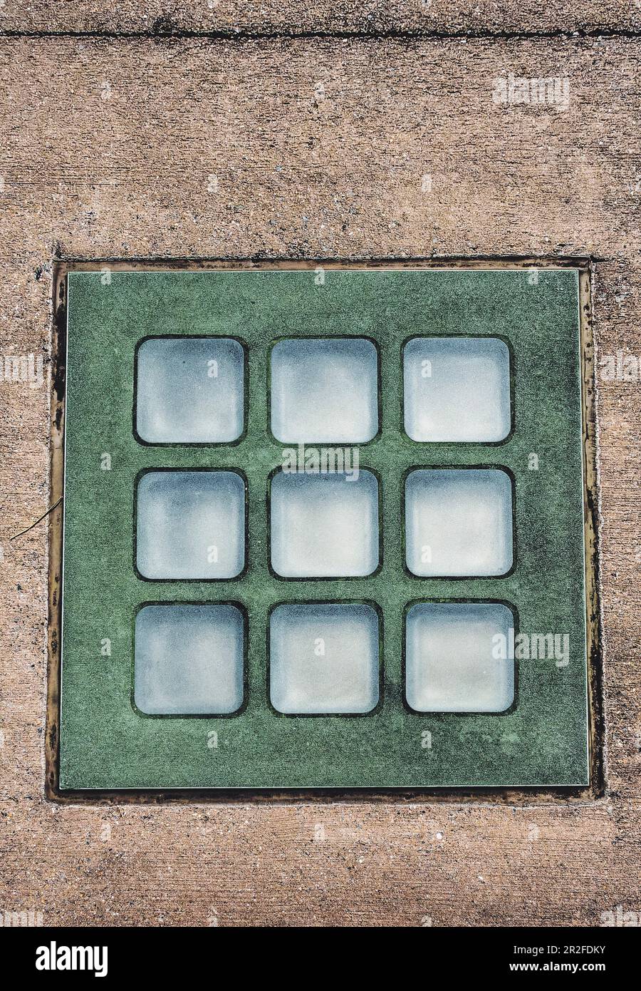 Opaque windows in a concrete wall Stock Photo - Alamy