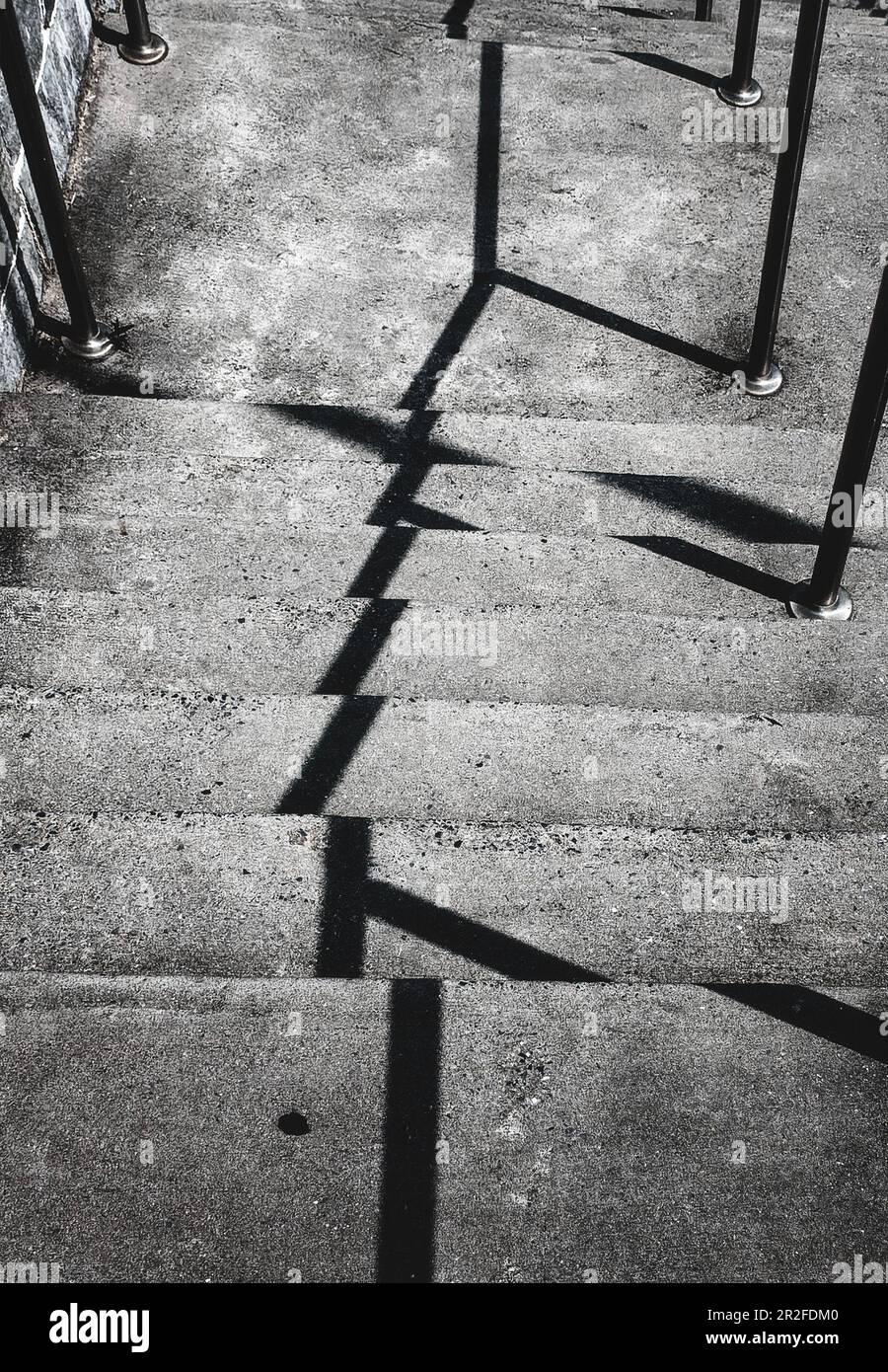 Deep shadows on an outdoor stairway Stock Photo - Alamy
