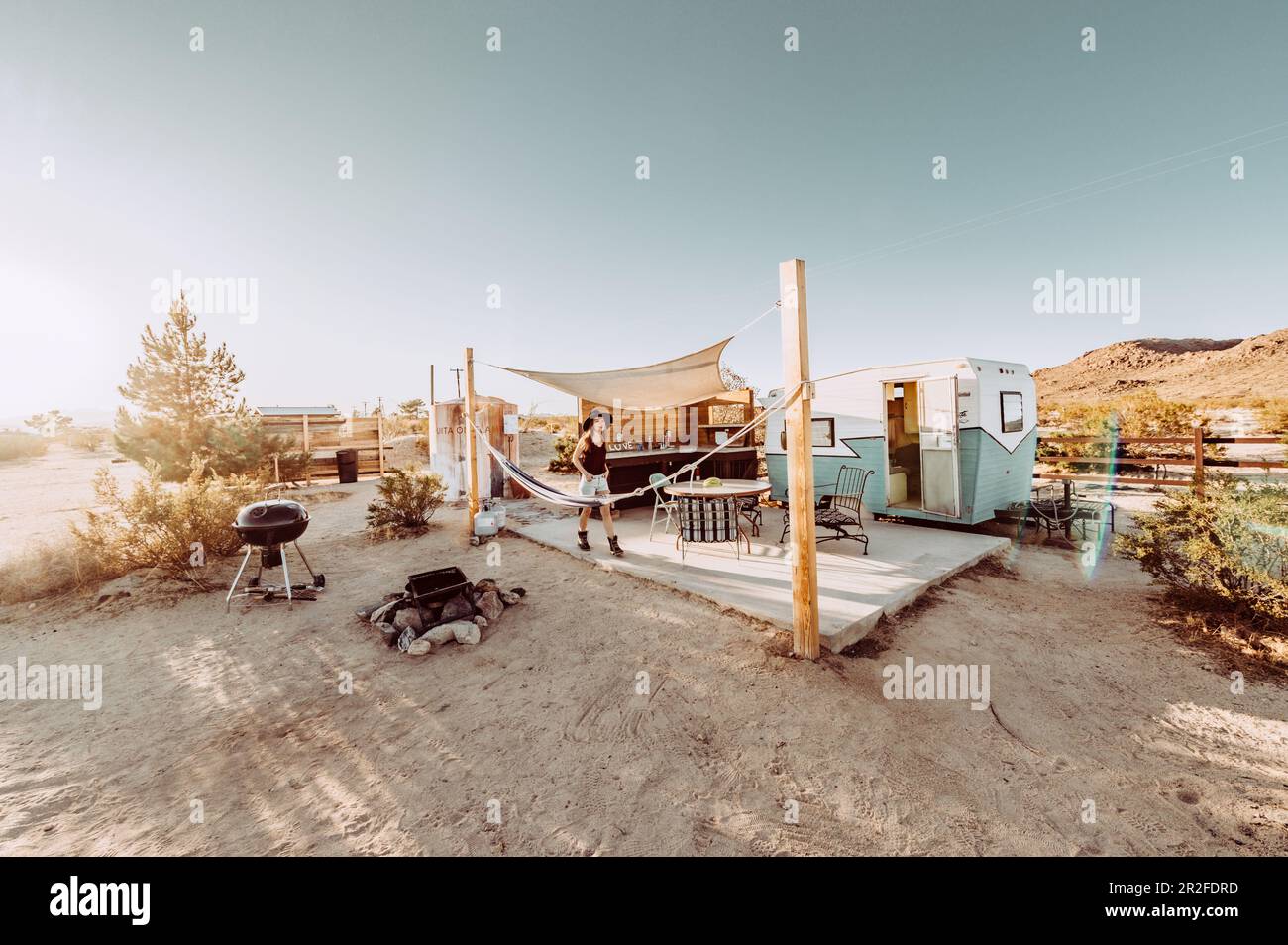 Woman running in front of caravan in Joshua Tree National Park, Joshua ...