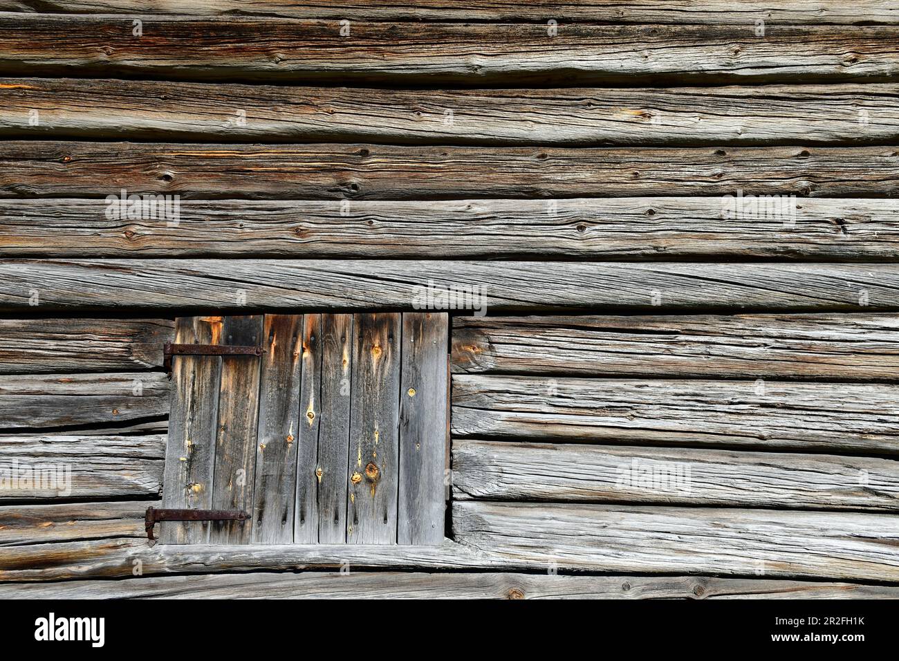 Close up view of a historic wooden hut with shutter, Särna, Dalarna ...