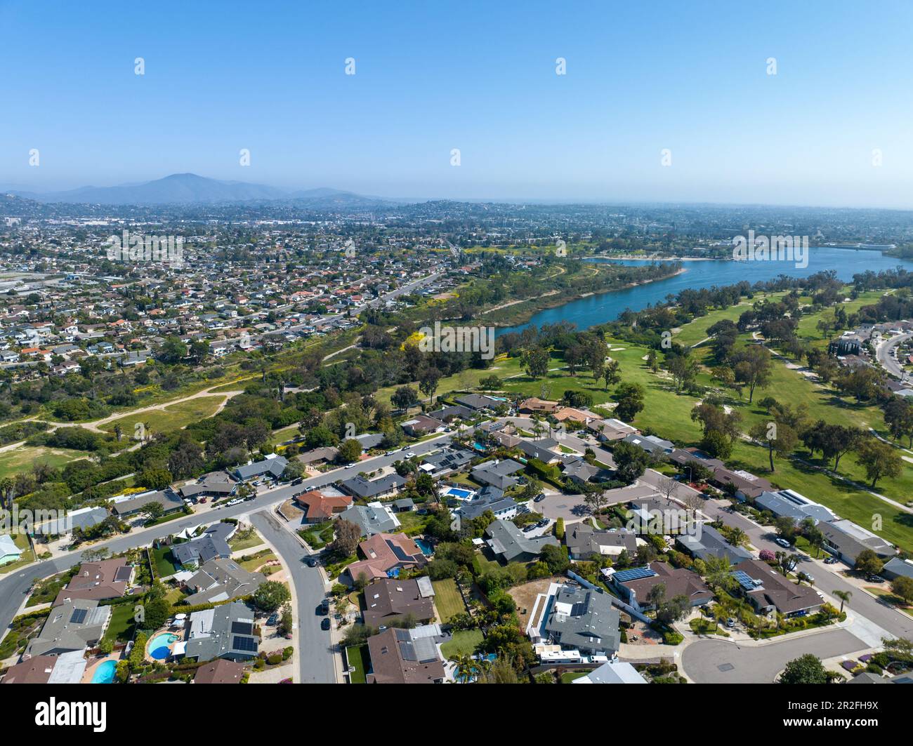 Aerial view of house around Lake Murray reservoir in San Diego ...
