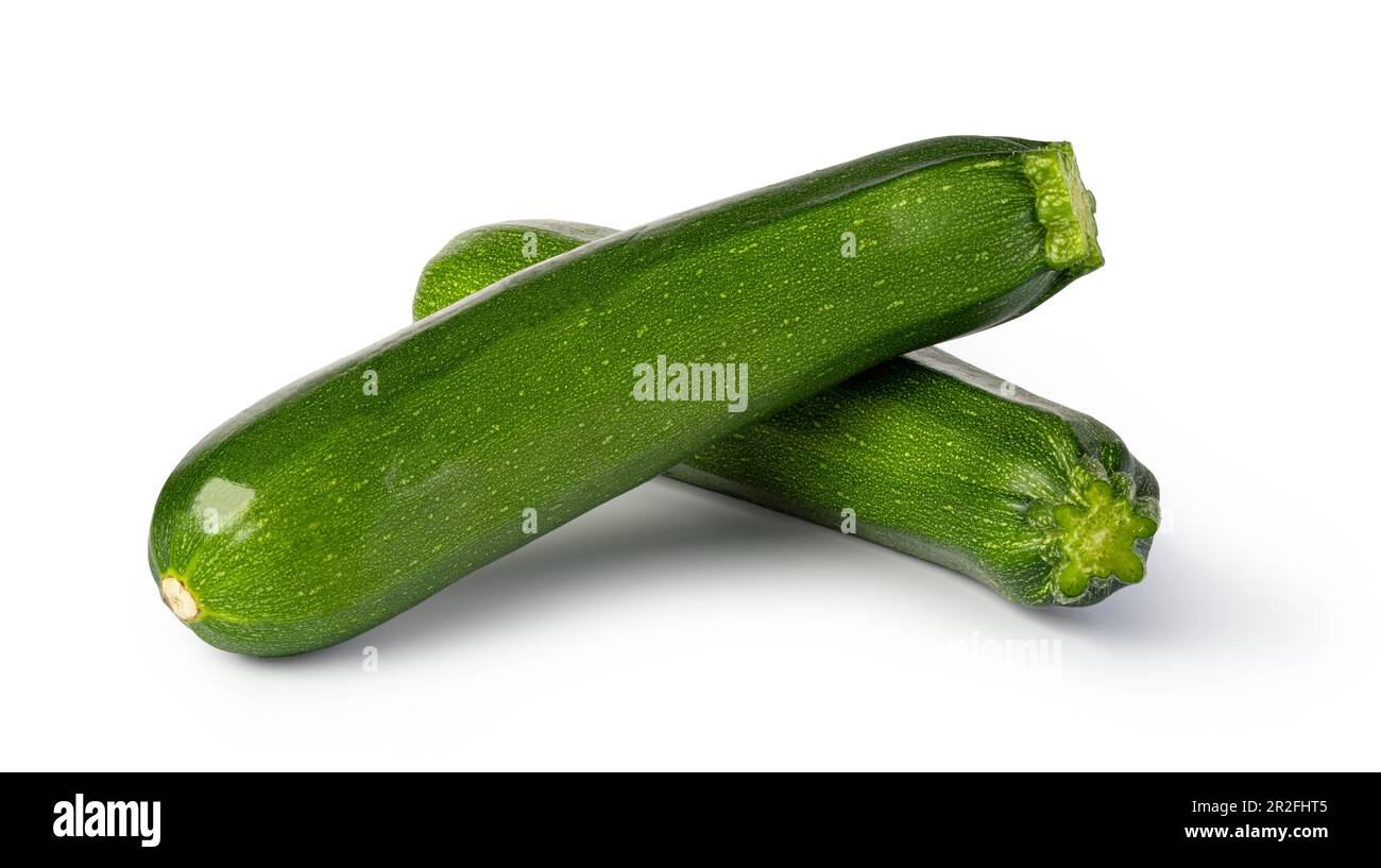 fresh green zucchini isolated on white background Stock Photo - Alamy