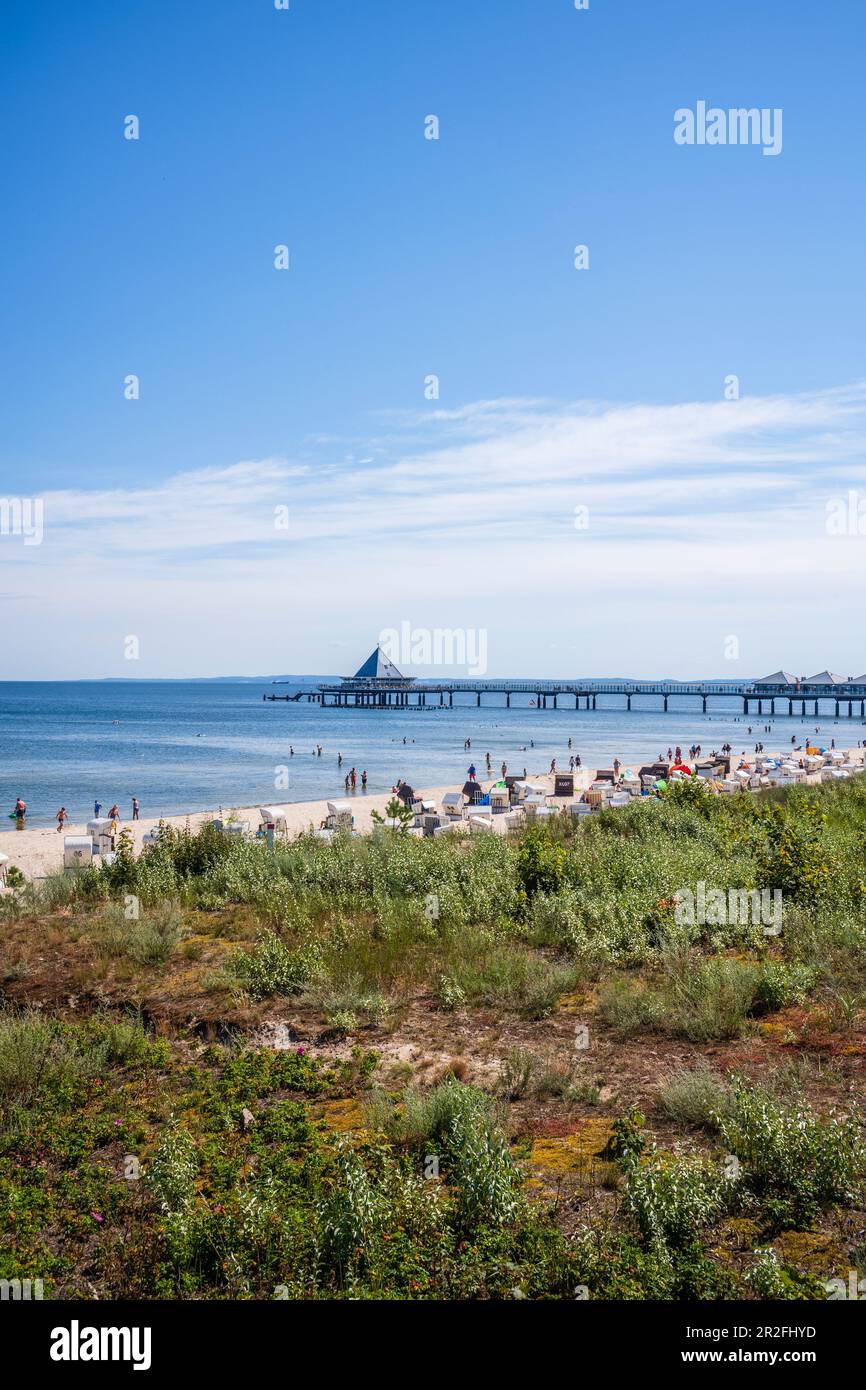 Idyllic panorama beach in Bansin, view of pier in Heringsdorf over a ...