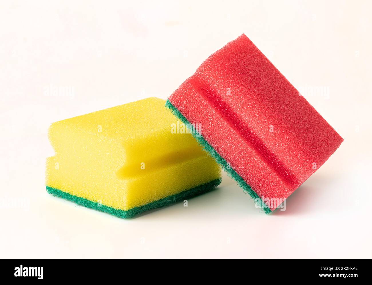 sponge for washing isolated on white background Stock Photo - Alamy
