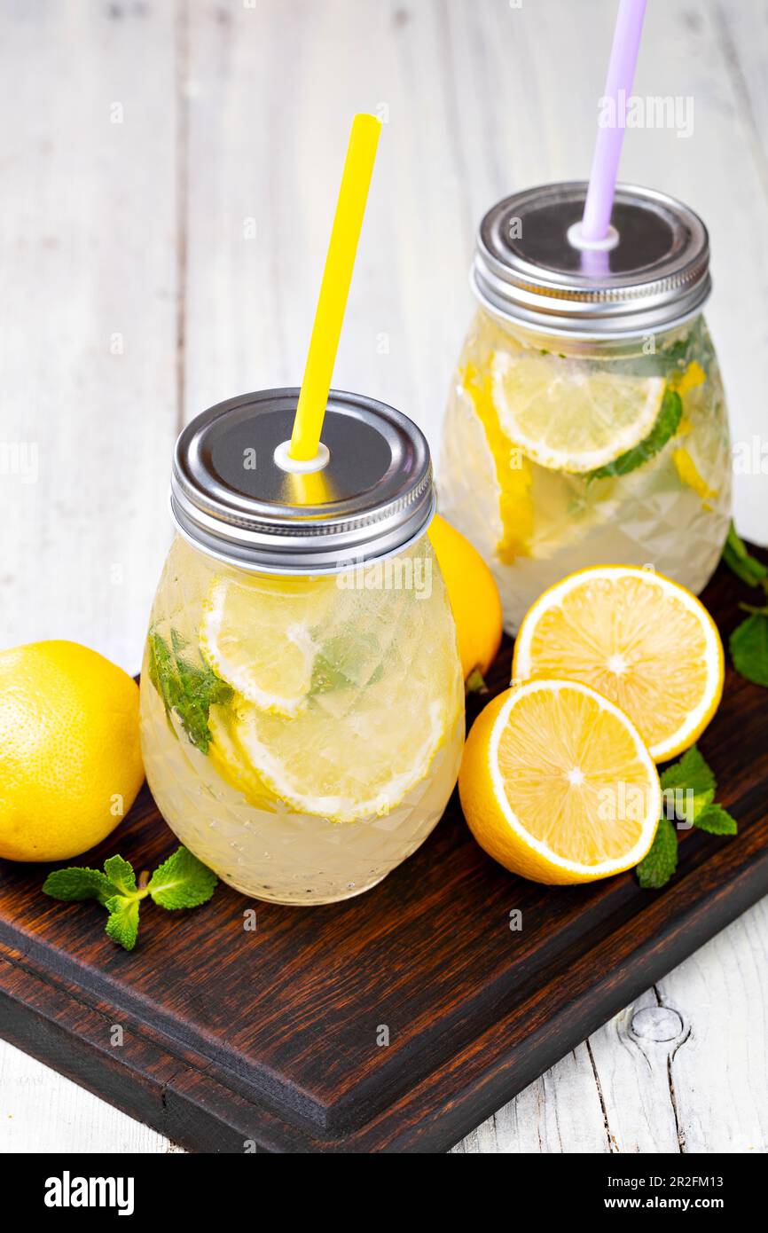 Glass of fresh lemonade on a table Stock Photo - Alamy