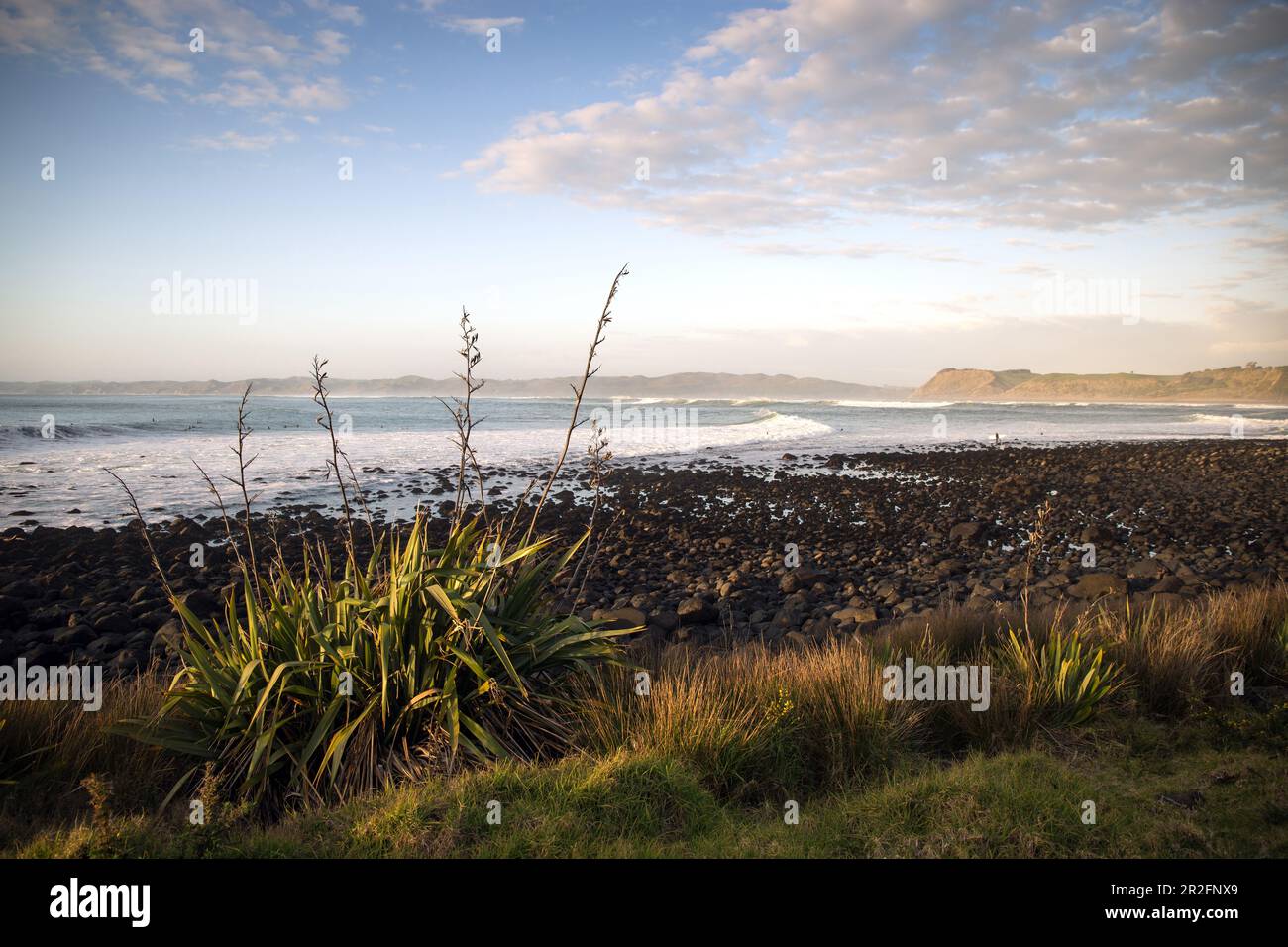 Sunset at Manu Bay in Raglan in the Waikato District, New Zealand Stock ...