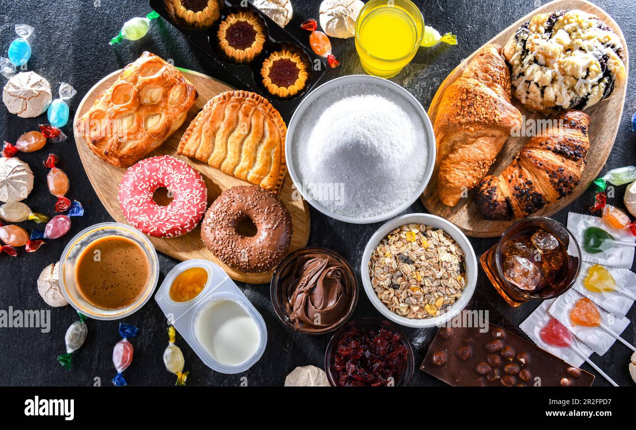 Food products containing a significant amount of sugar. Junk food Stock ...