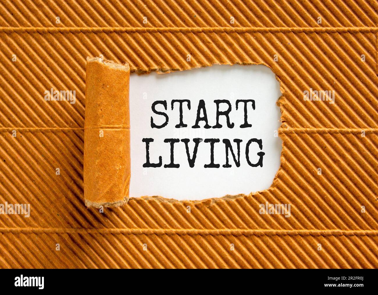Start living symbol. Concept words Start living on beautiful white ...