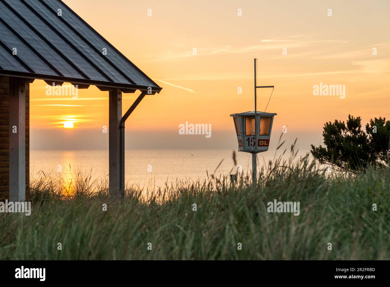Sunrise on the beach of Dahme with DLRG watchtower, Baltic Sea ...