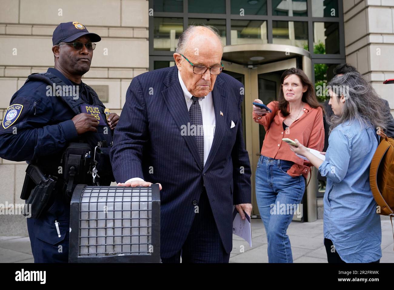 Former New York City Mayor Rudy Giuliani departs the federal courthouse ...