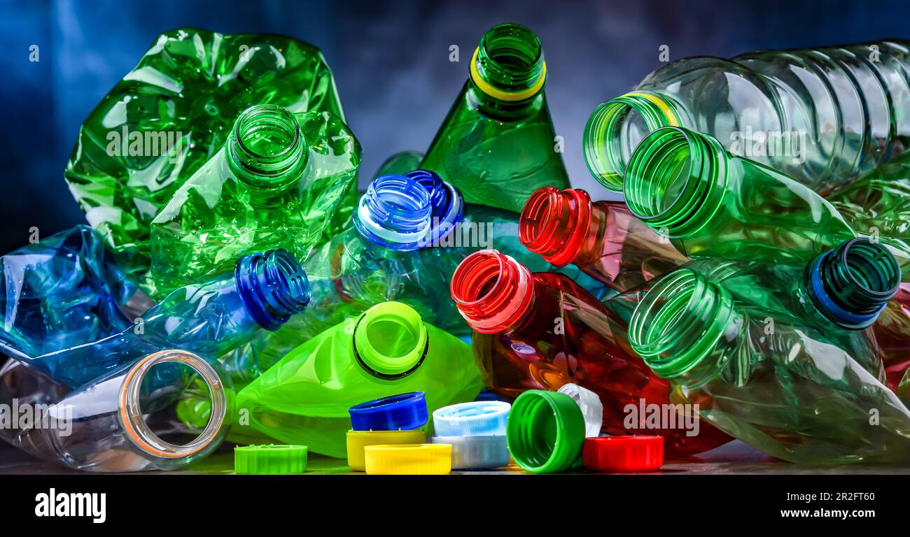 Empty colored drink bottles. Recyclable plastic waste Stock Photo - Alamy