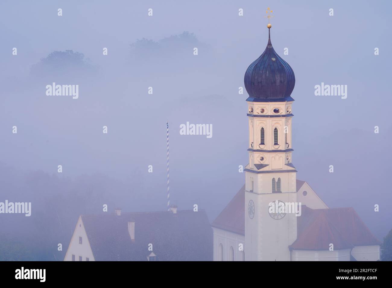 The church of Pähl in the early autumn fog, Pähl, Germany Stock Photo ...