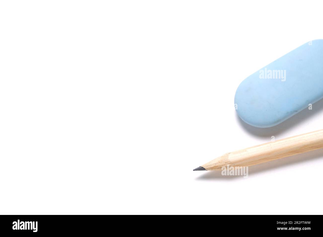Simple pencil and eraser white background Stock Photo - Alamy