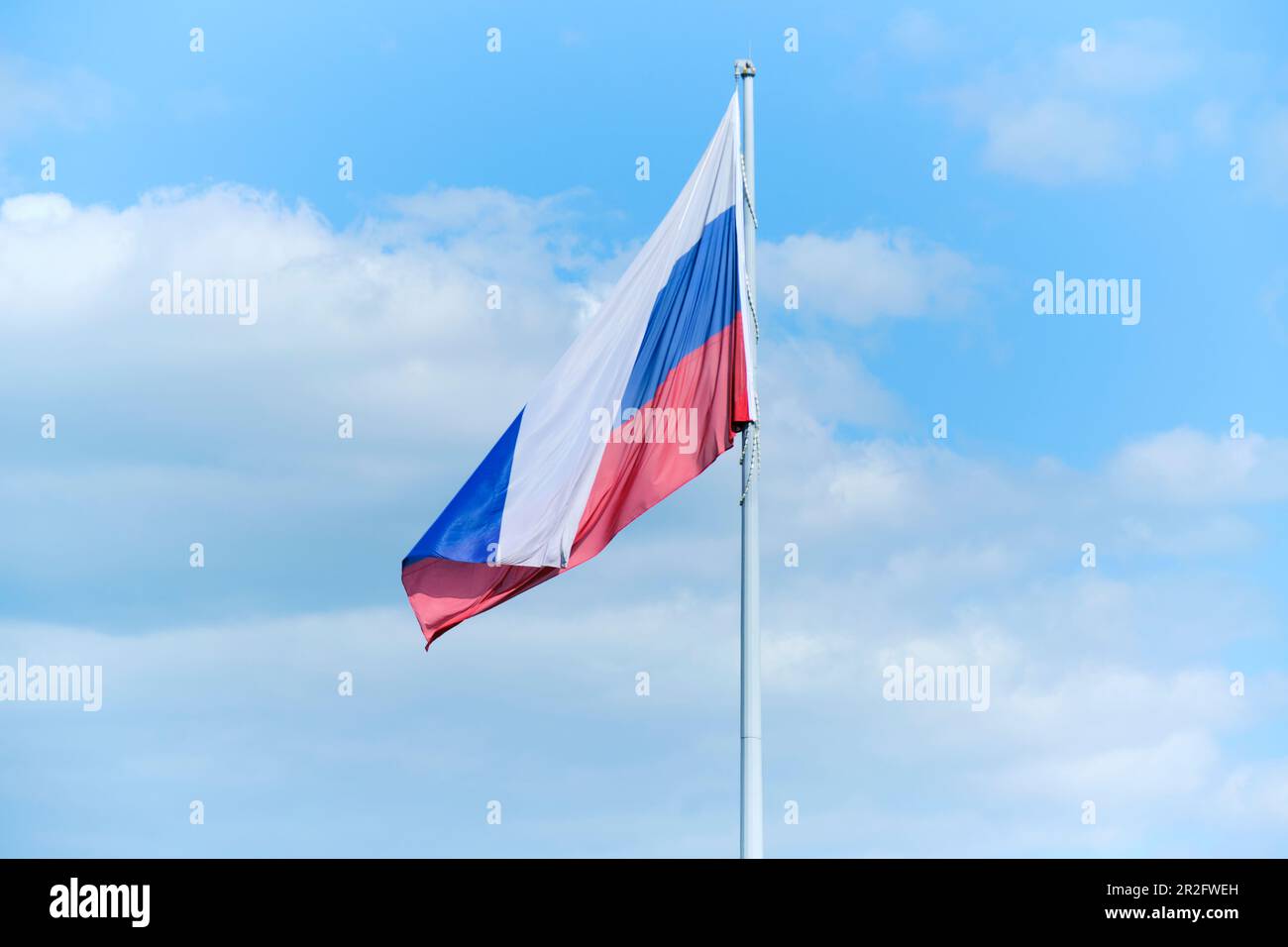 Tricolor, flag Russian Federation blue sky background Stock Photo - Alamy