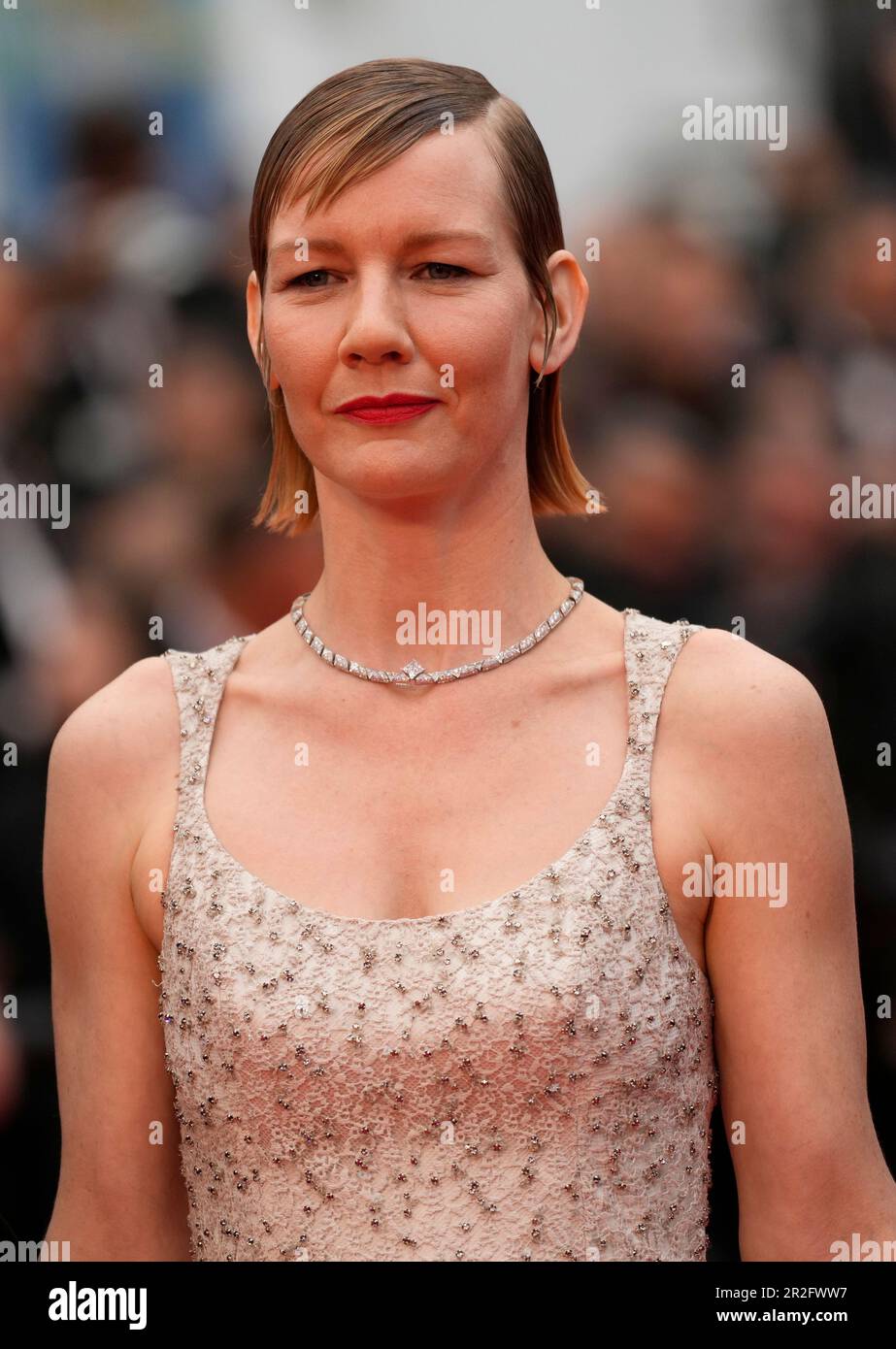 Sandra Huller poses for photographers upon arrival at the premiere of the film 'The Zone of ...