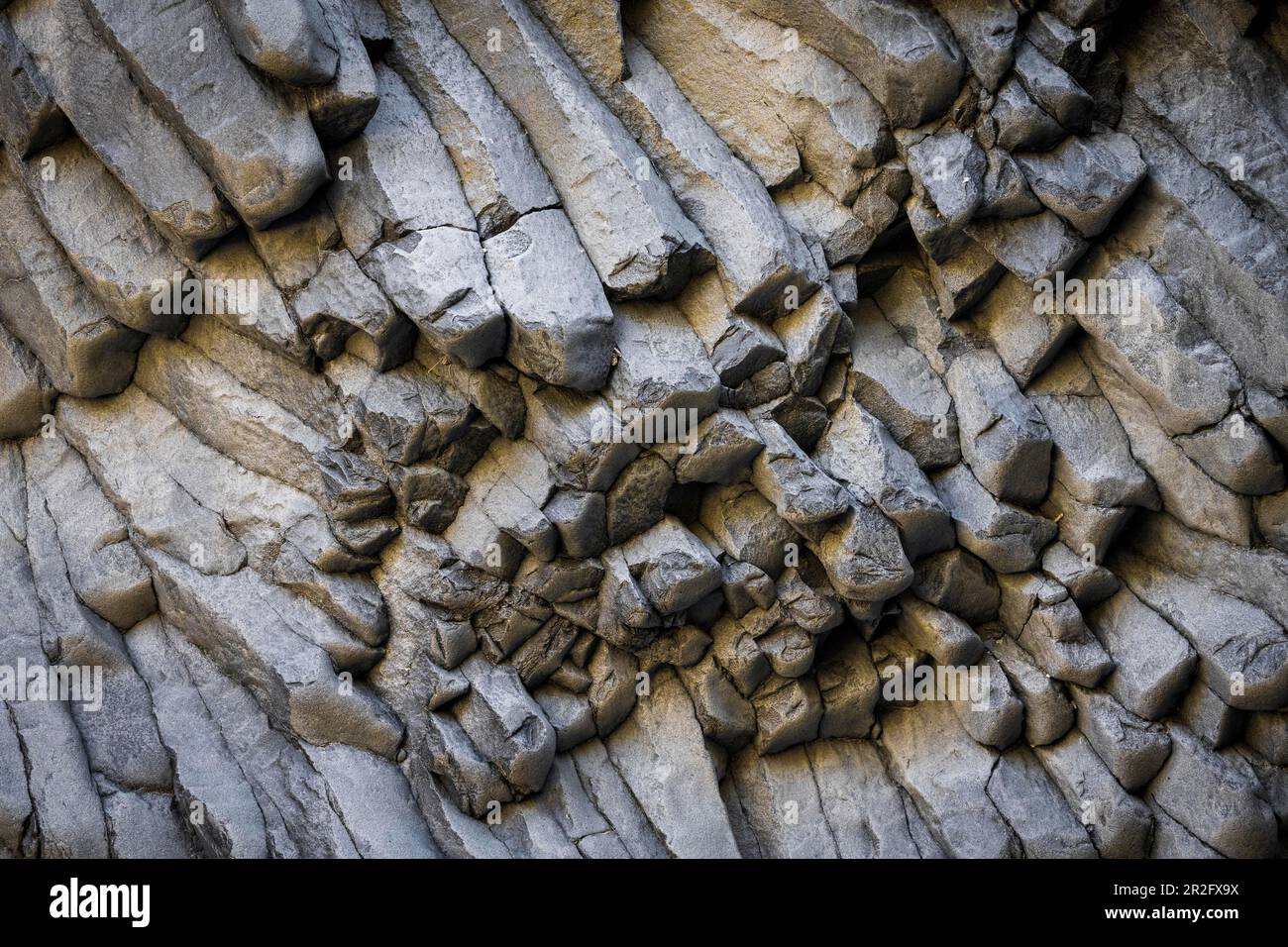 Rock formations of basalt and lava rock in the river park Gole dell ...