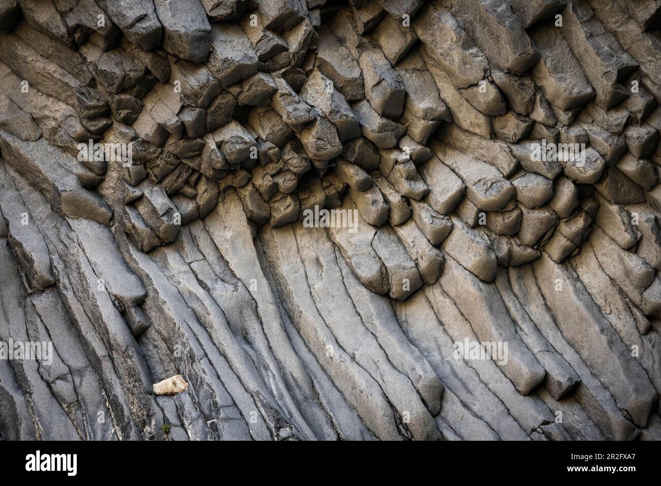 Rock formations of basalt and lava rock in the river park Gole dell ...